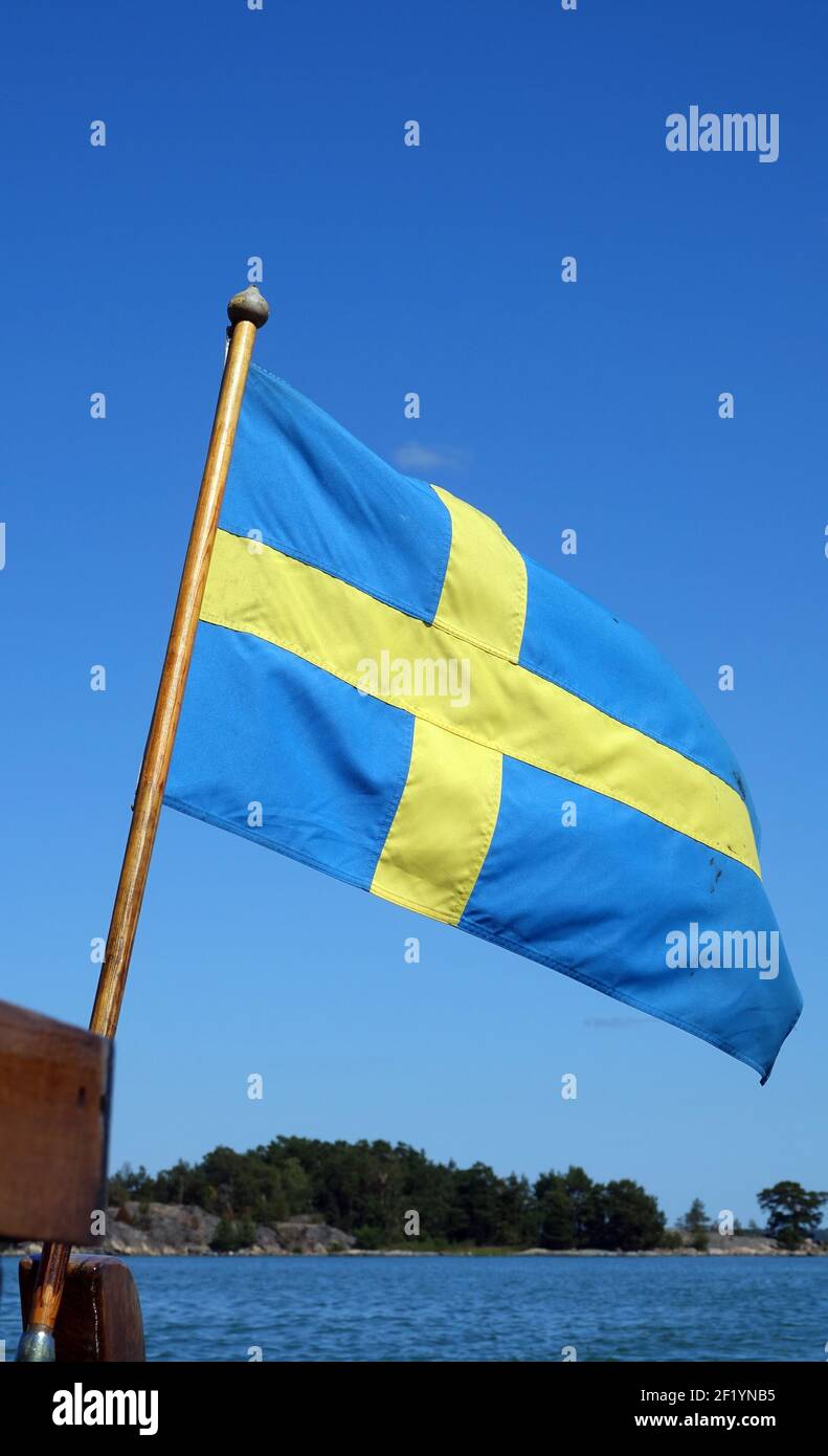 Swedish flag on a boat on the archipelago Stock Photo - Alamy