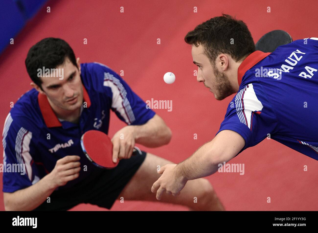 Emmanuel Lebesson, Simon Gauzy of France compete in Tennis Table Men's ...