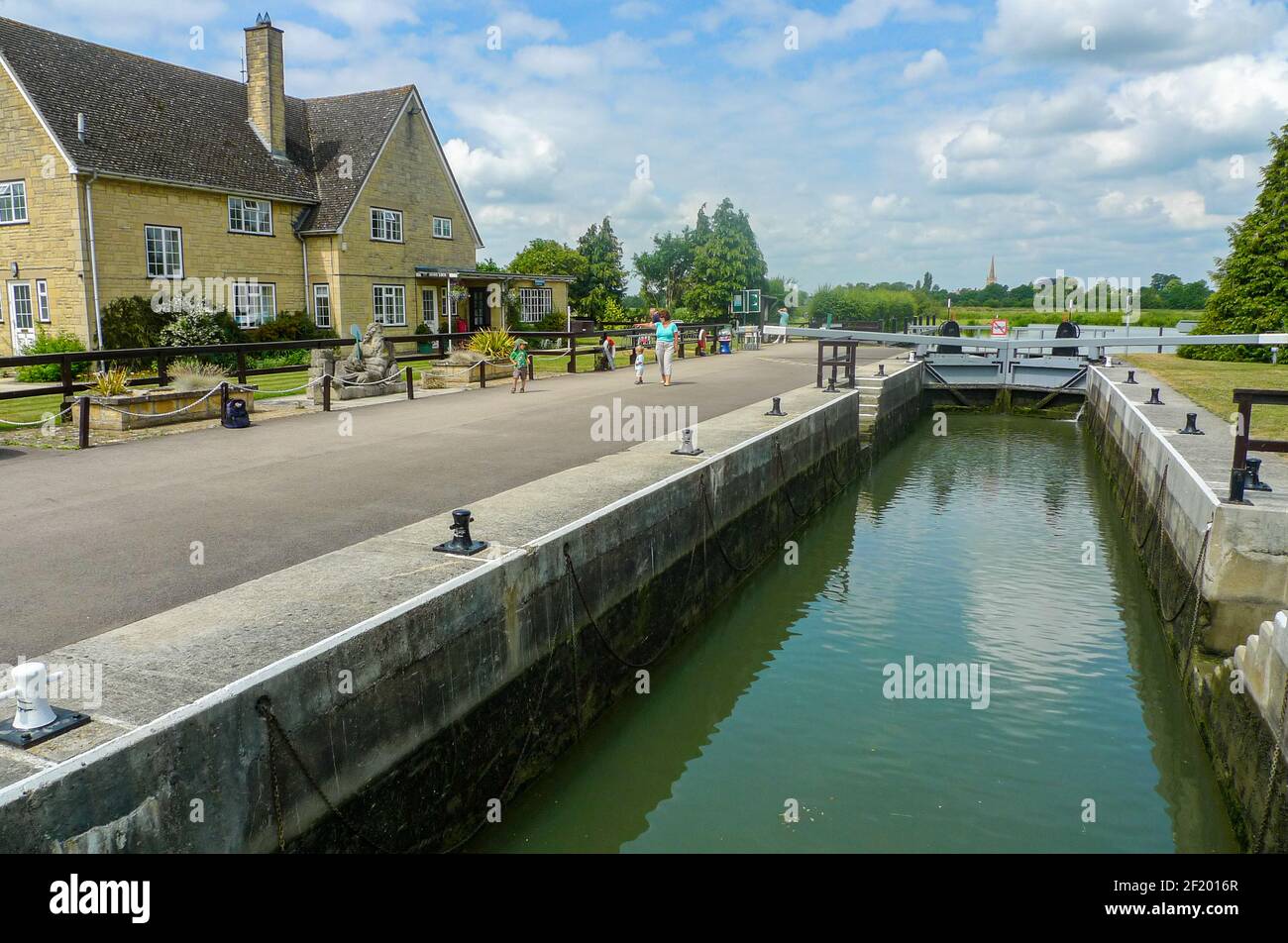 River Thames: Woman pointing at statue of Father Thames at St John's ...