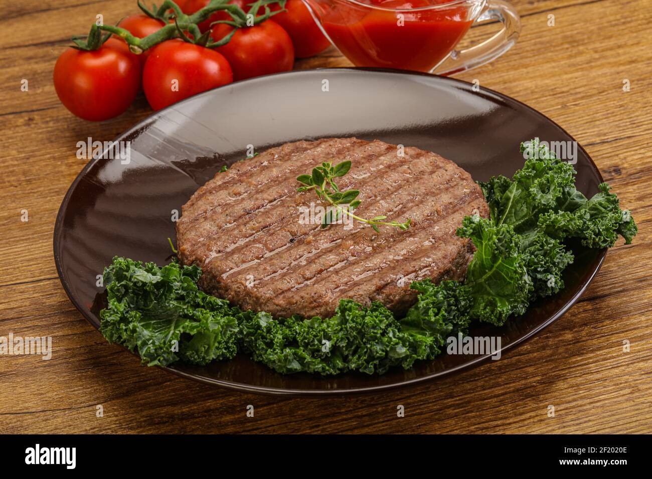 Grilled tasty beef cutlet for burger Stock Photo - Alamy