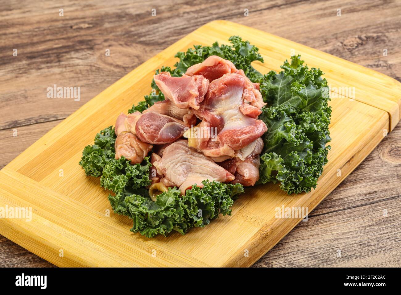 Raw tasty chicken stomach for cooking Stock Photo - Alamy