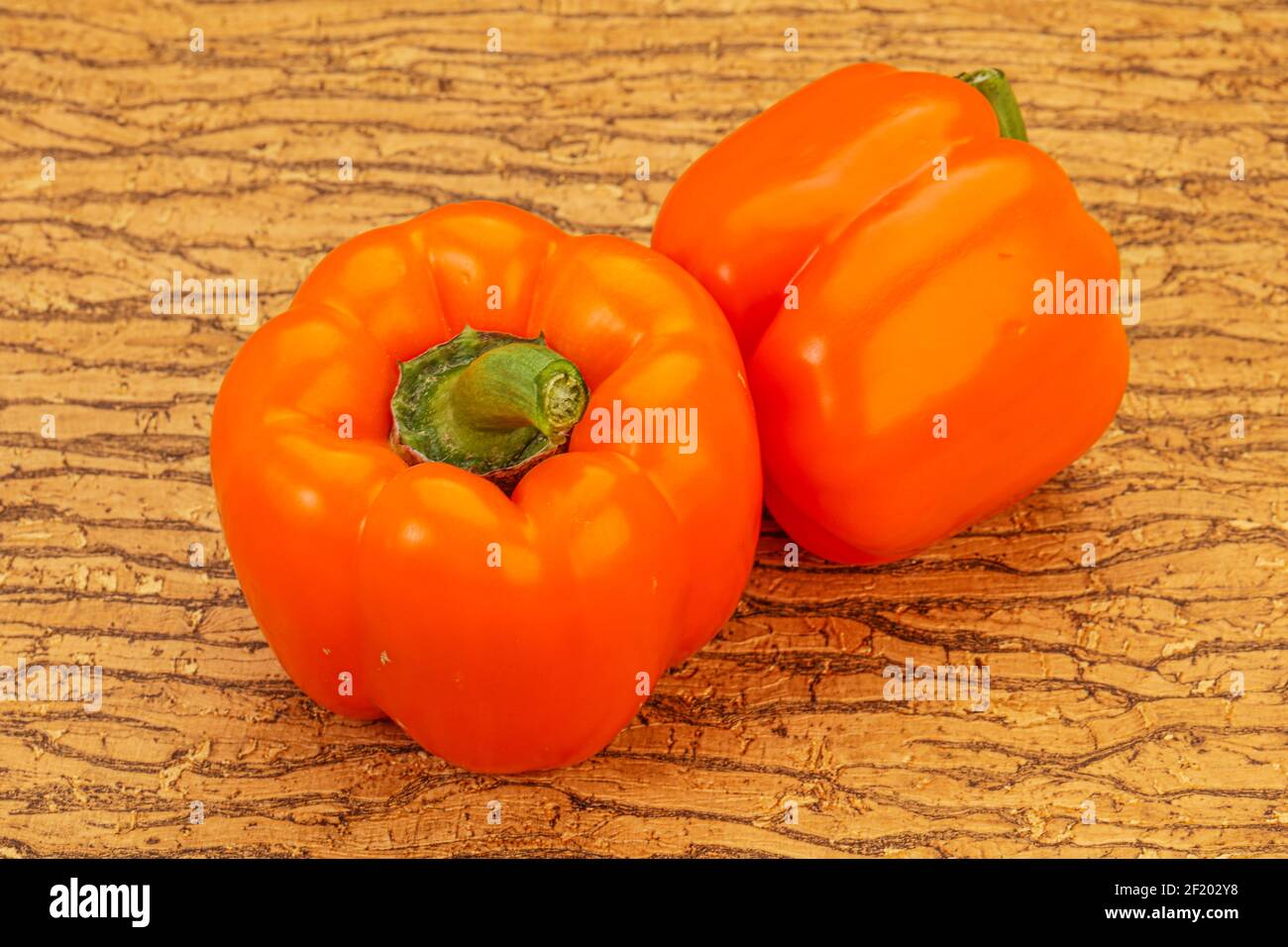 Two Orange sweet tasty Bell Pepper Stock Photo - Alamy