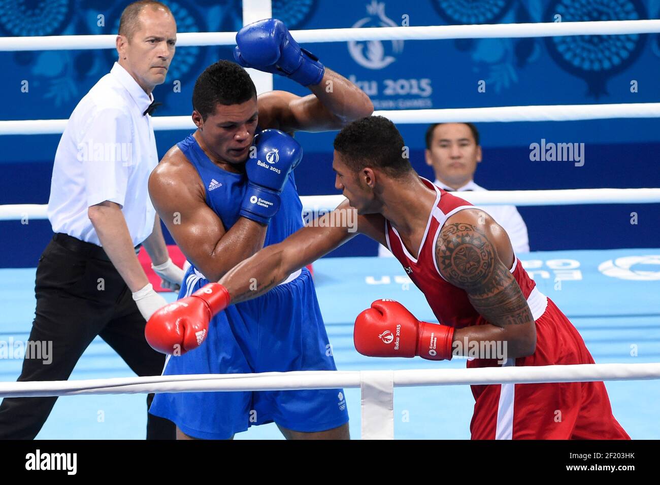 Tony Yoka of France (red) competes in Boxing Mens Super Heavy (+91kg ...