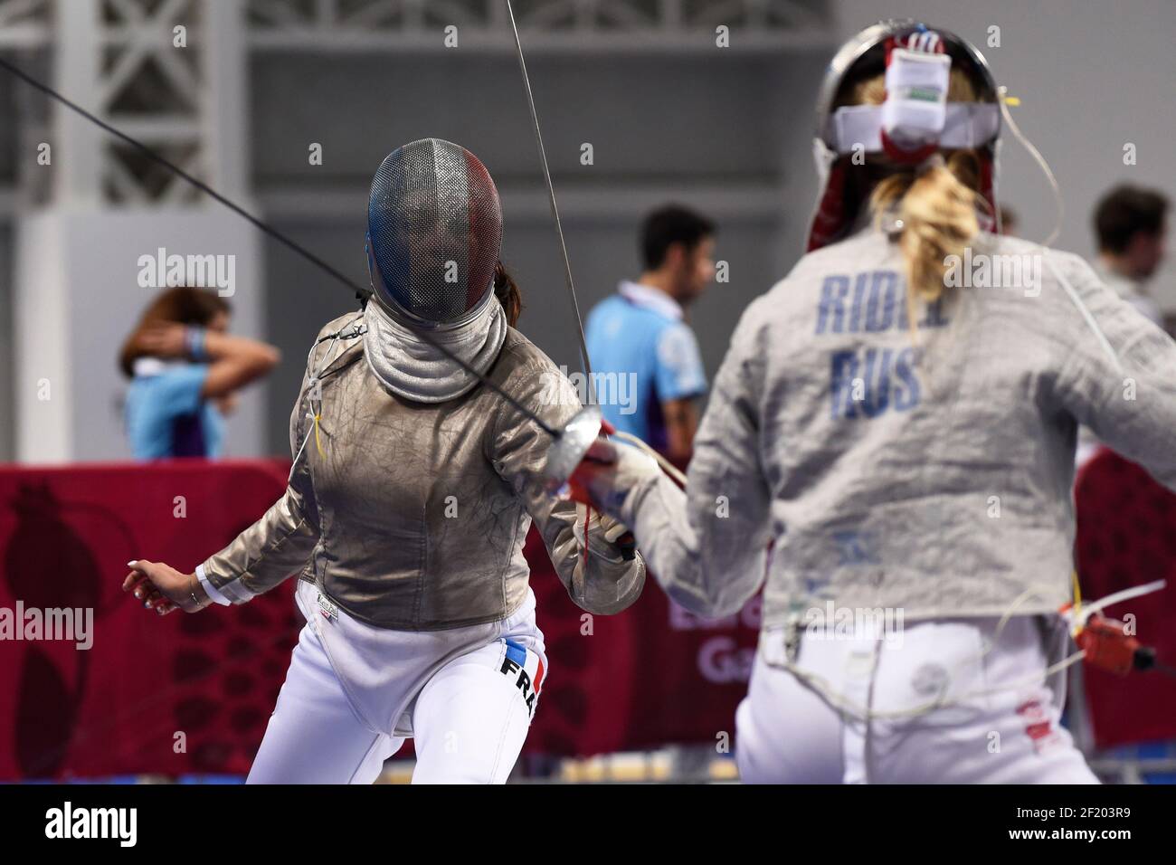 Sara Balzer of France (left) competes in Fencing Women's Individual ...