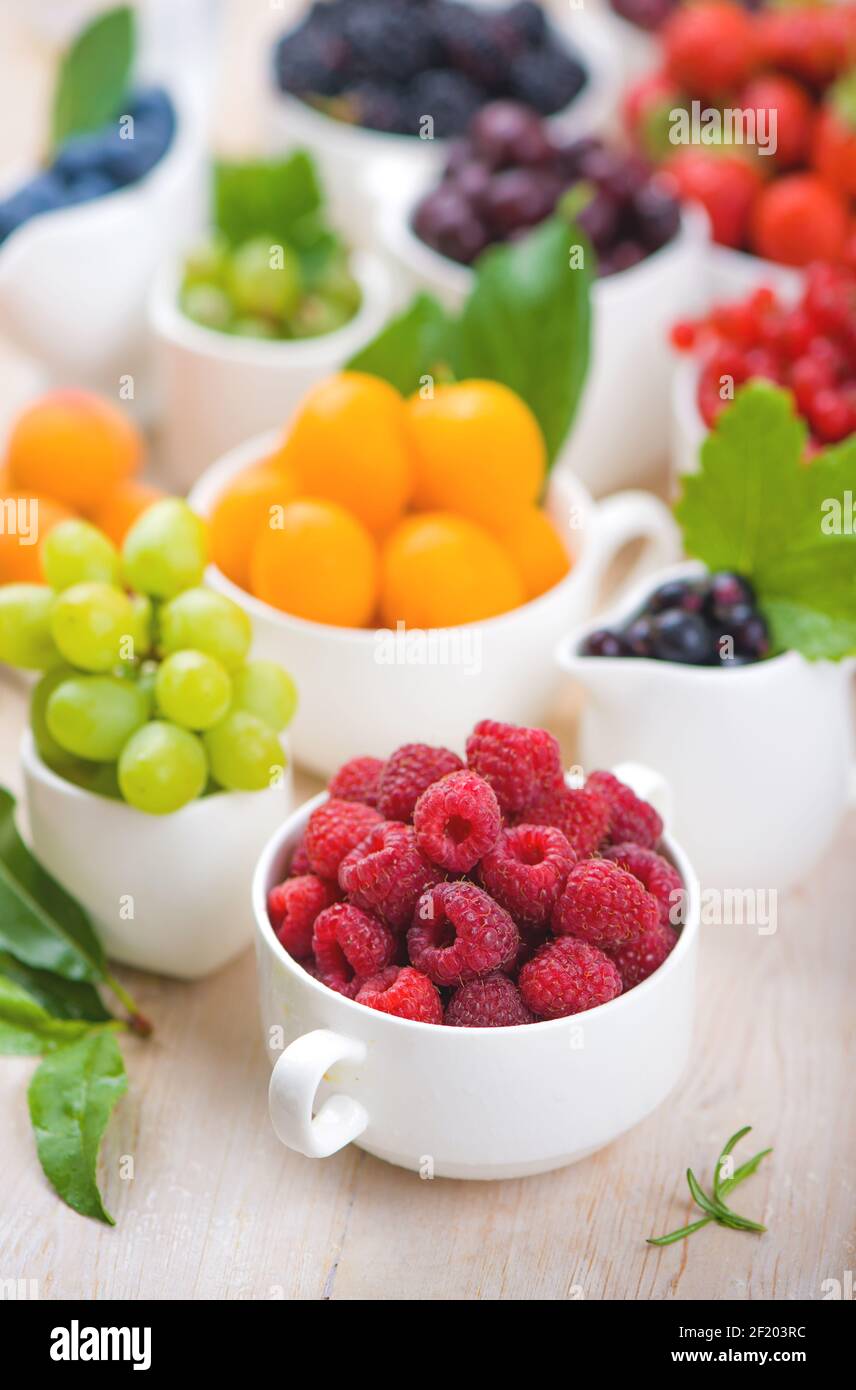 berry mix isolated on a white background Stock Photo - Alamy