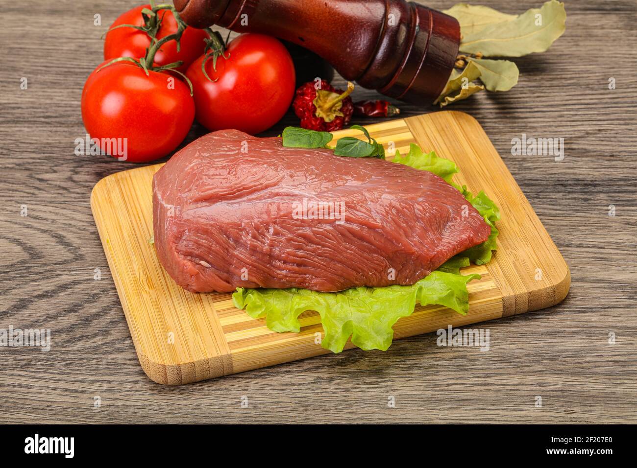Raw beef meat piece for cooking Stock Photo - Alamy