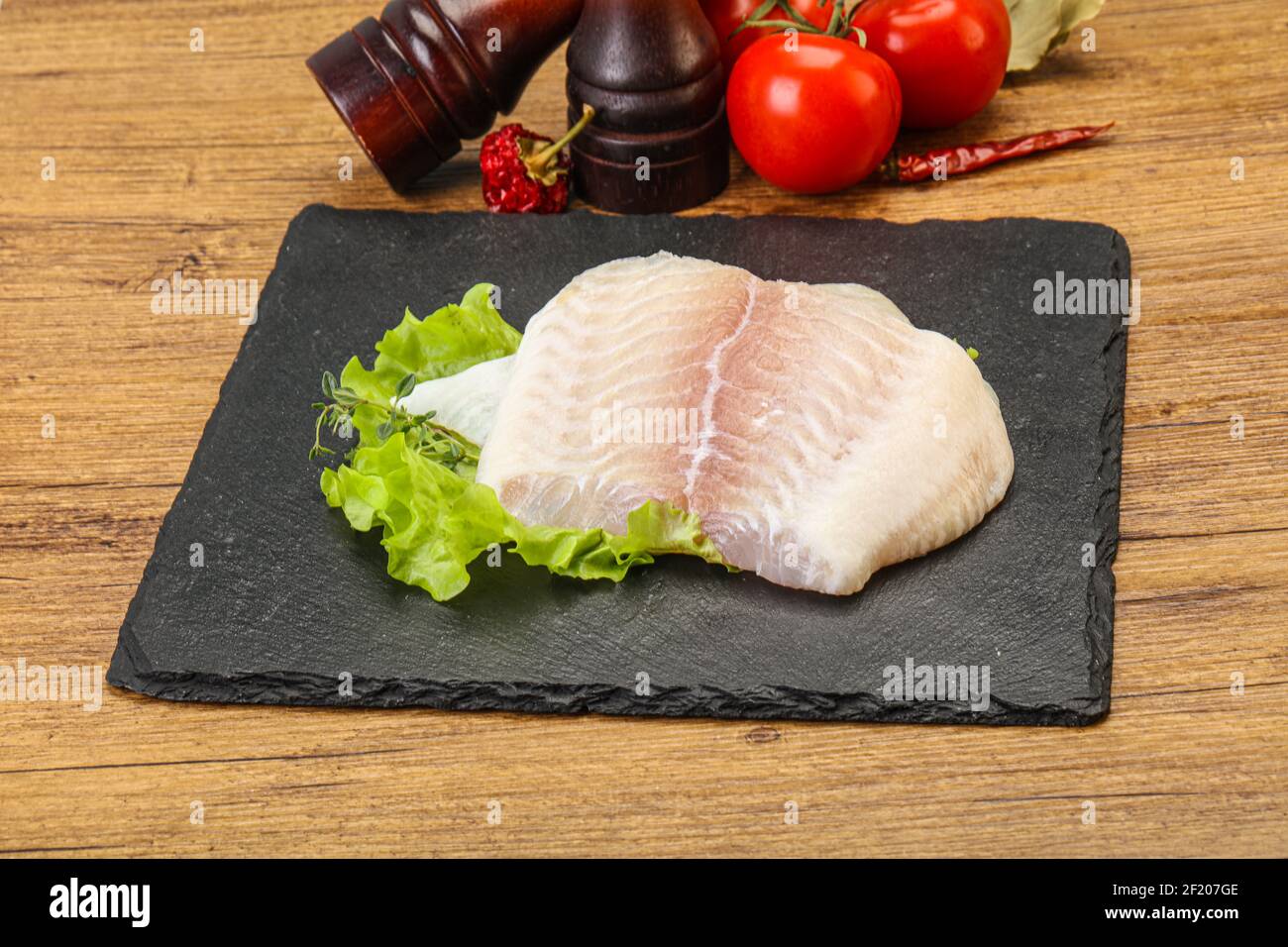 Raw pangasius fillet fish for cooking Stock Photo - Alamy