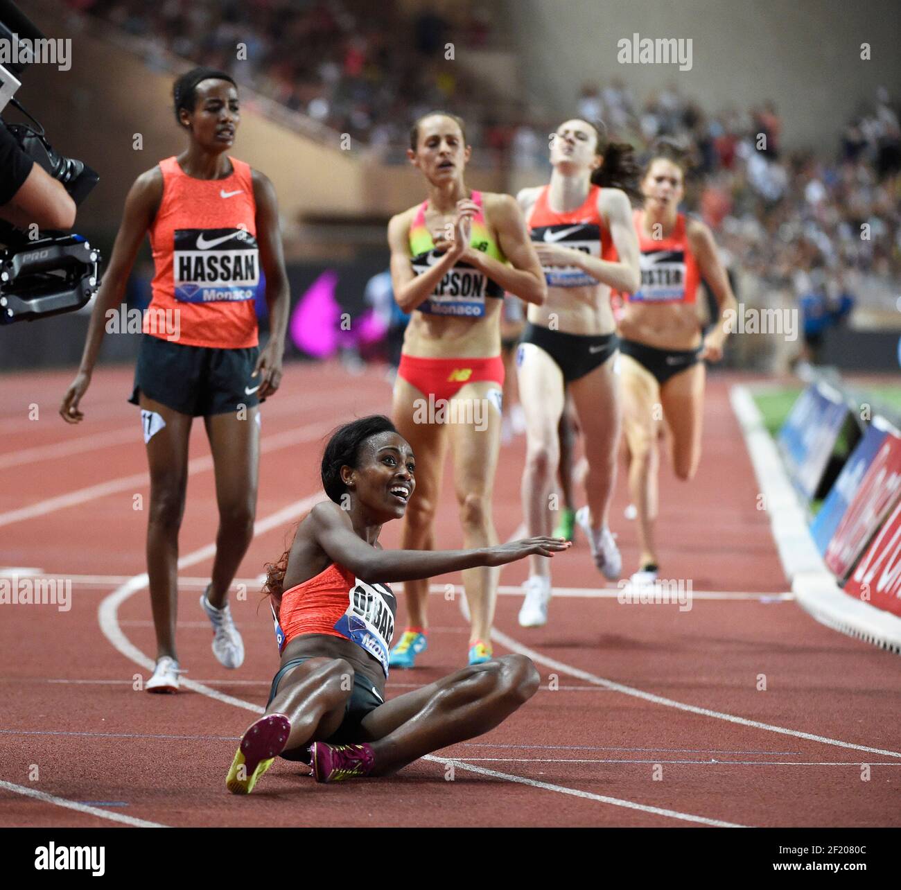 Genzebe Dibaba of Ethiopia (down) competes and breaks the World record ...