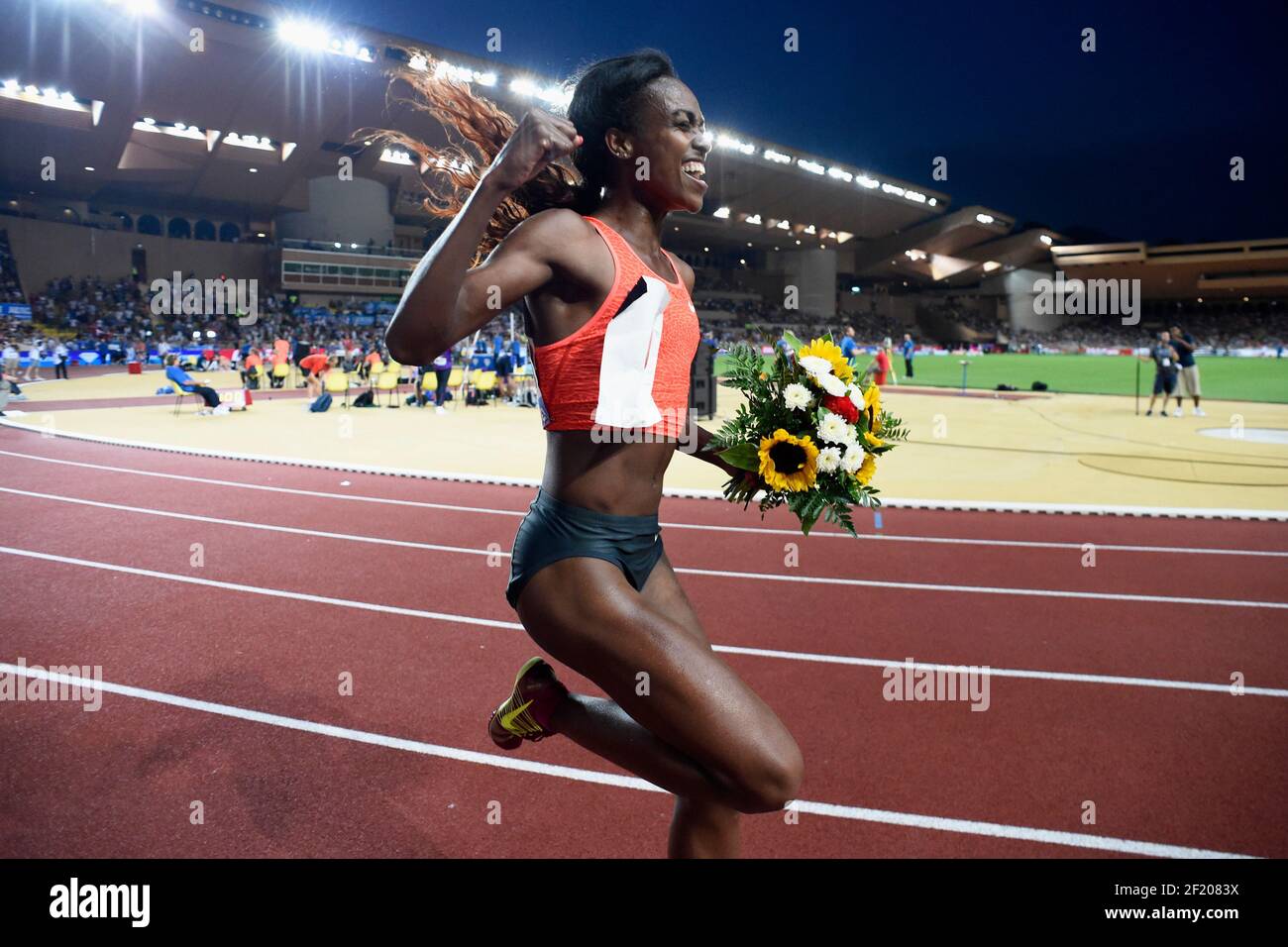 Genzebe Dibaba of Ethiopia competes and breaks the World record in ...