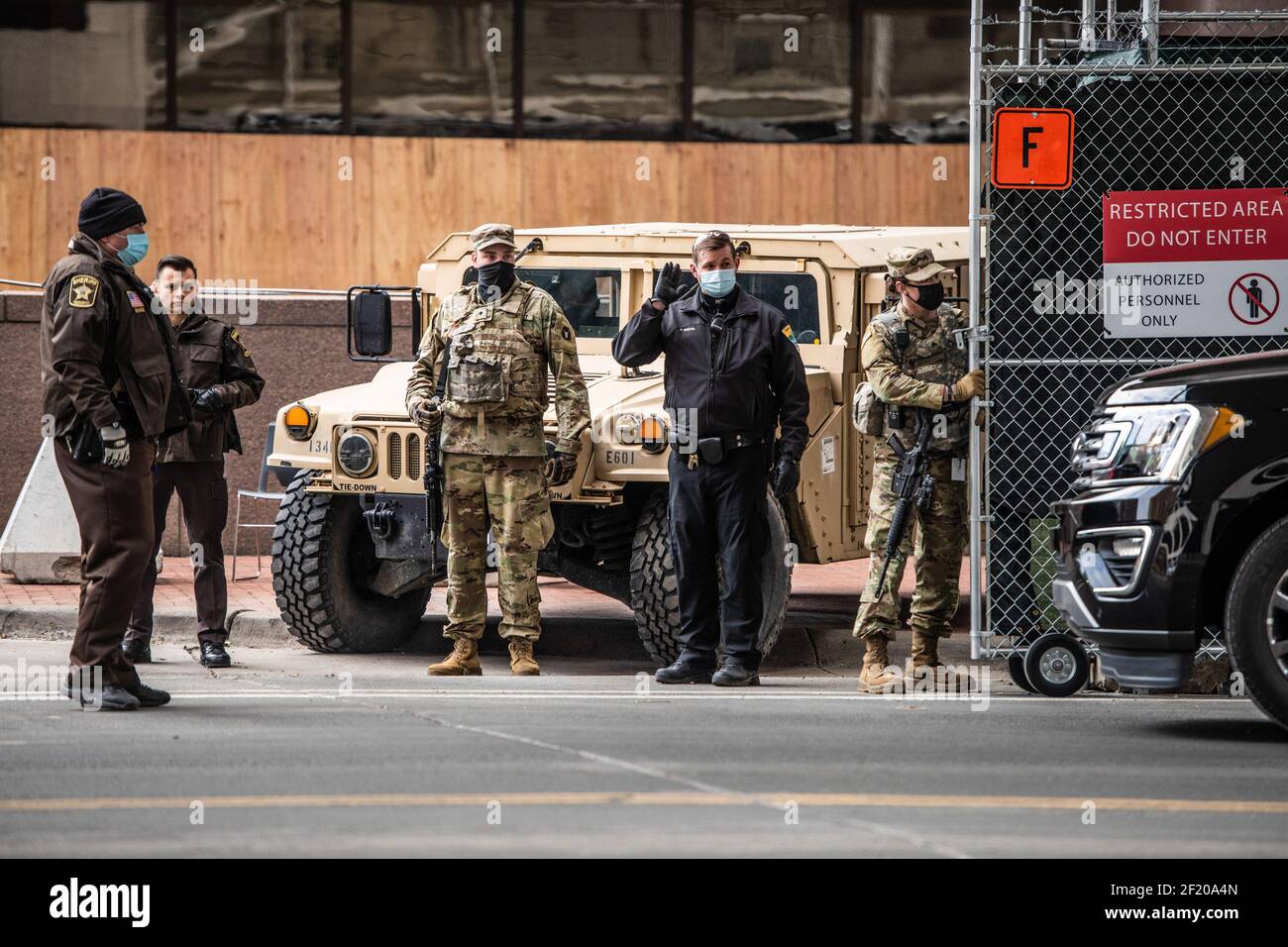 National Guard and Hennepin County Security officers guard the gate in ...