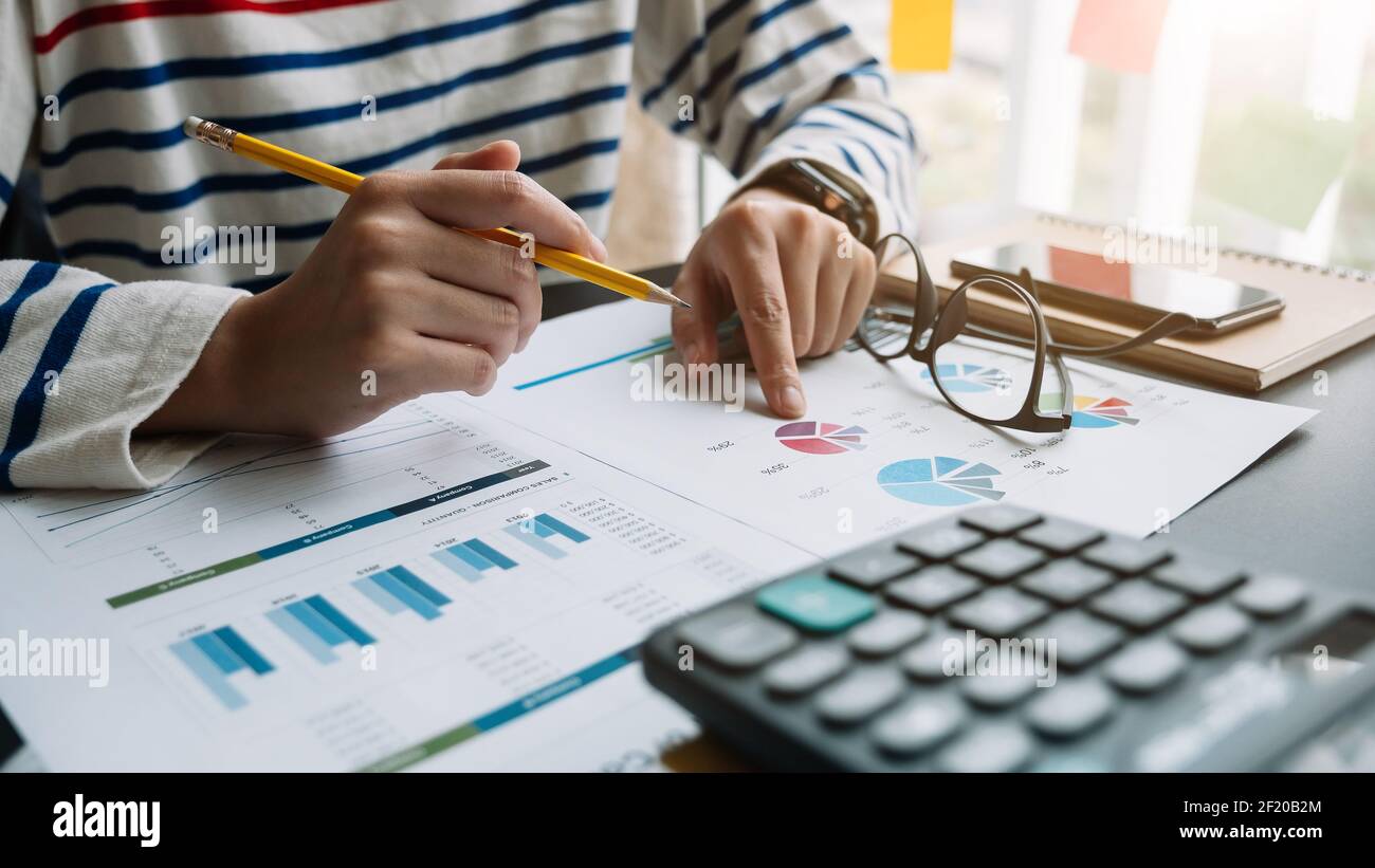 Report with pencil hi-res stock photography and images - Alamy