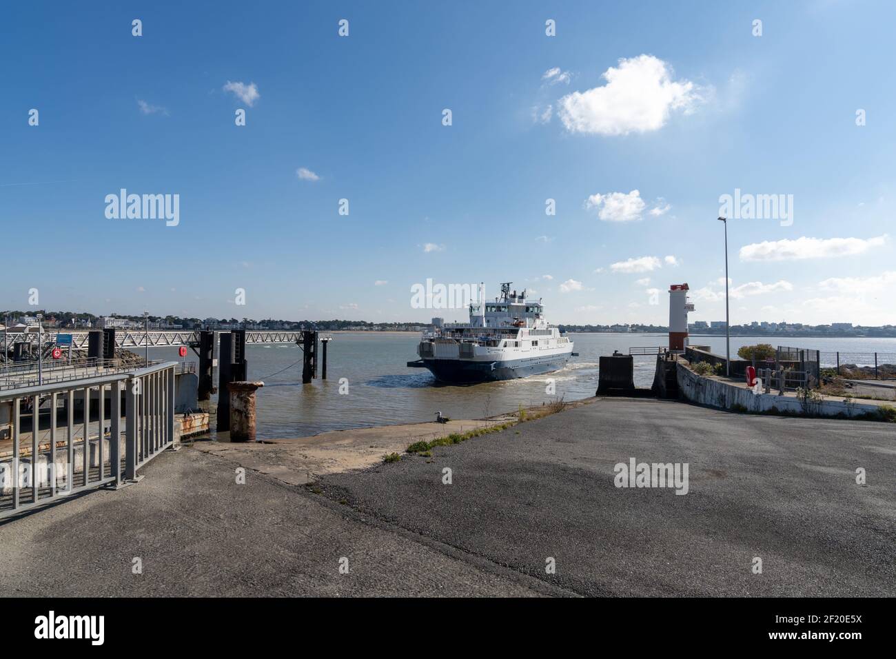 The Gironde ferry arrives at the port of Royan to load and transfer ...