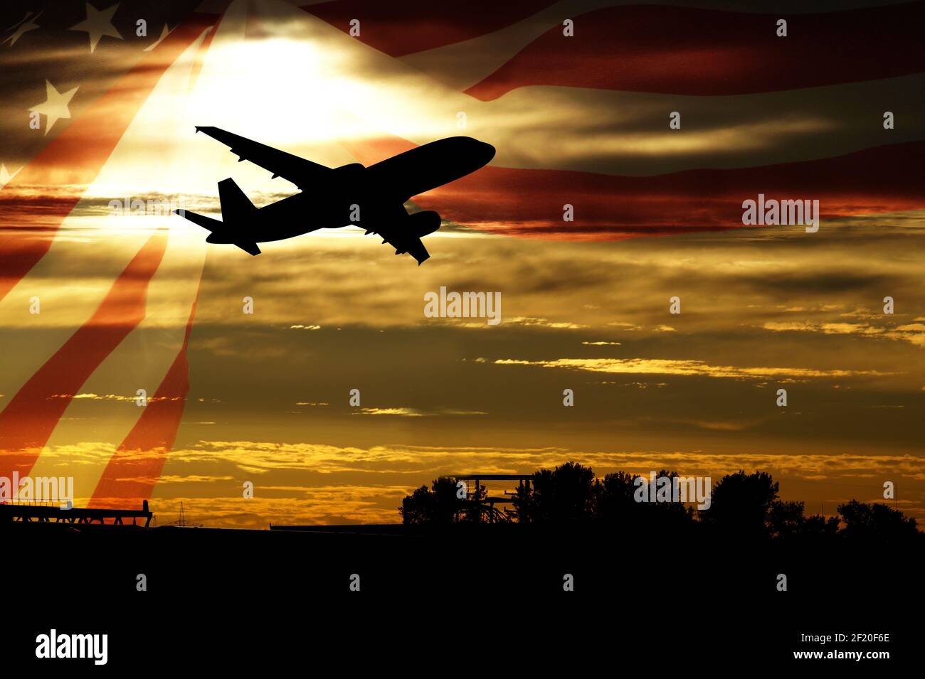 An airplane and flag of America Stock Photo - Alamy