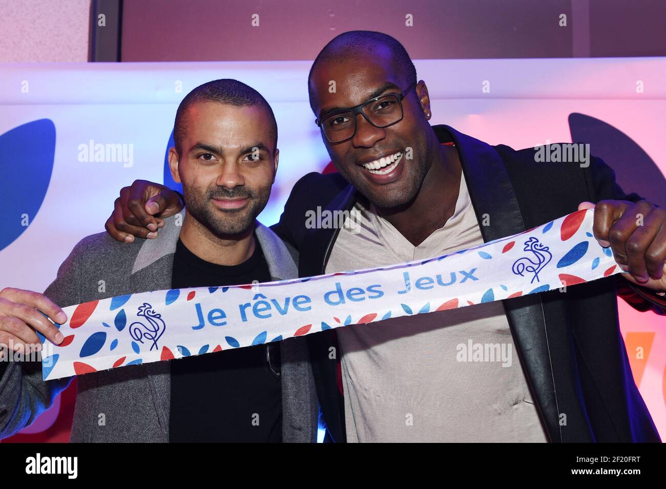 Basketball player Tony Parker and judoka Teddy Riner pose during the ...