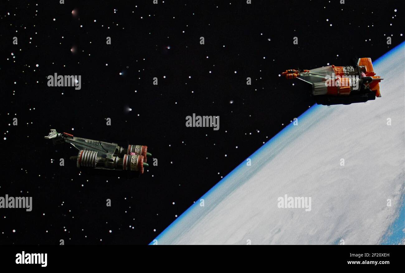 A 3D rendering of two parts of a spaceship flying in the space Stock ...