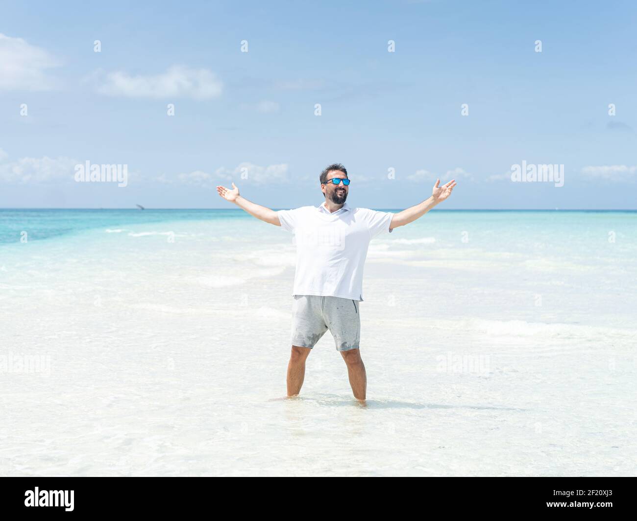 One man is enjoying beautiful tropical beach Stock Photo - Alamy