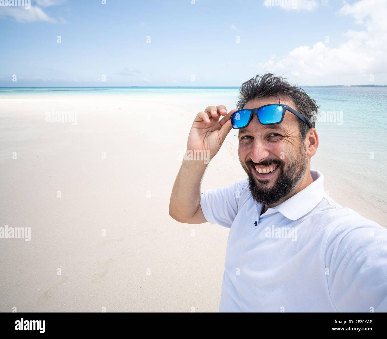 One man is enjoying beautiful tropical beach Stock Photo - Alamy