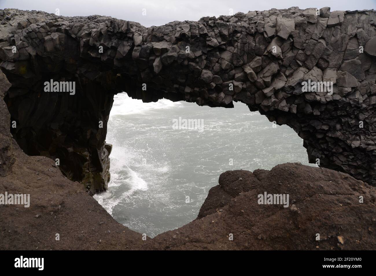 Rock arch at Dyrholaey, Iceland Stock Photo - Alamy