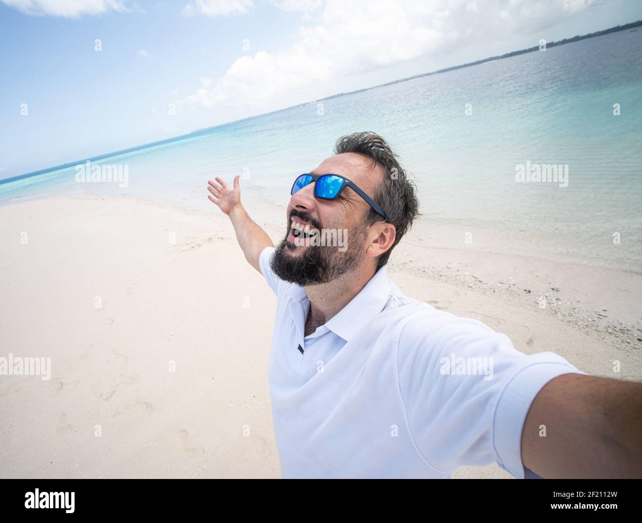 One man is enjoying beautiful tropical beach Stock Photo - Alamy