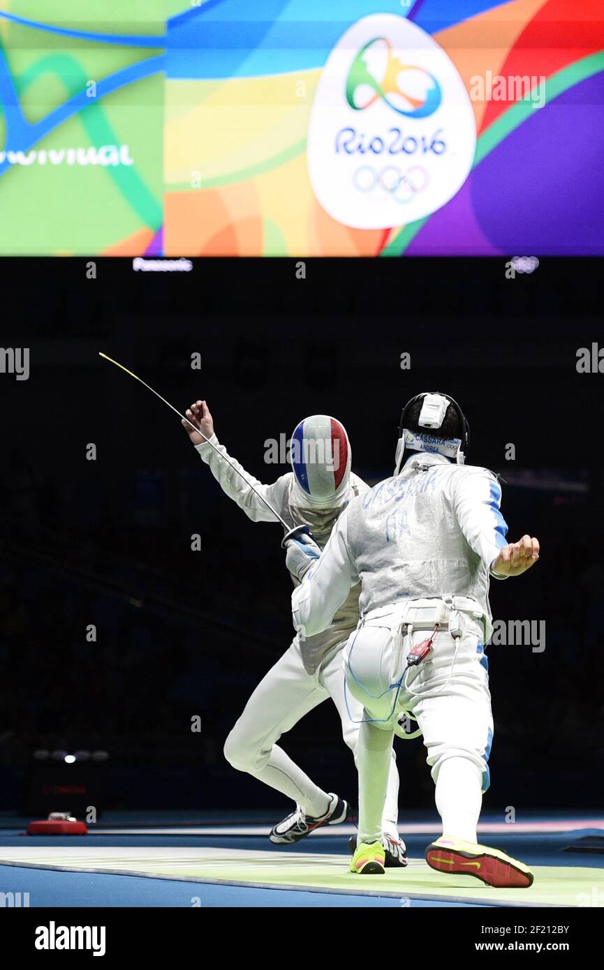 France's Jeremy Cadot competes vs Italy's Andrea Cassara during the ...