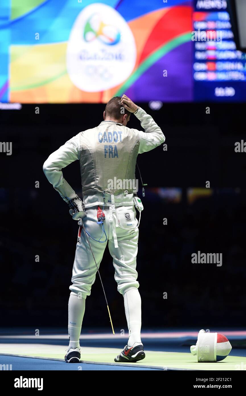 France's Jeremy Cadot reacts after his defeat vs Italy's Andrea Cassara ...