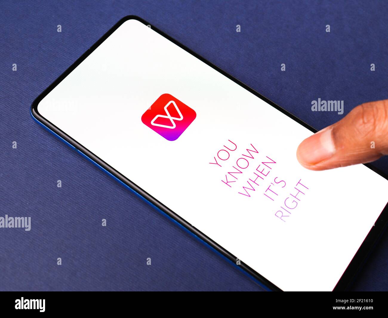 Assam, india - March 10, 2021 : Woo app logo on phone screen stock ...