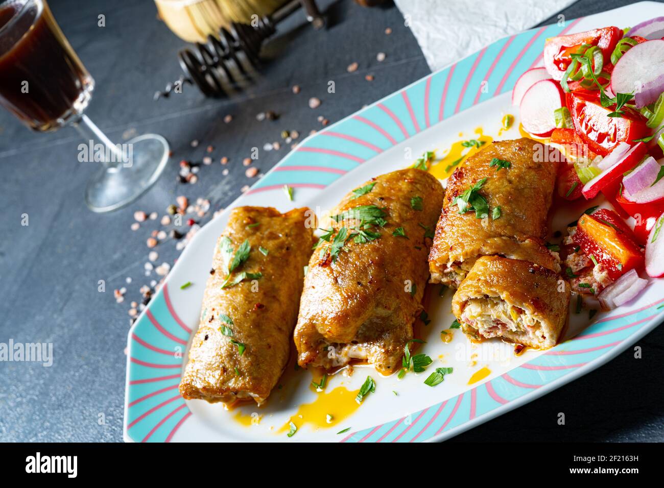 Vegetable roulade from roast pork loins with salads Stock Photo - Alamy