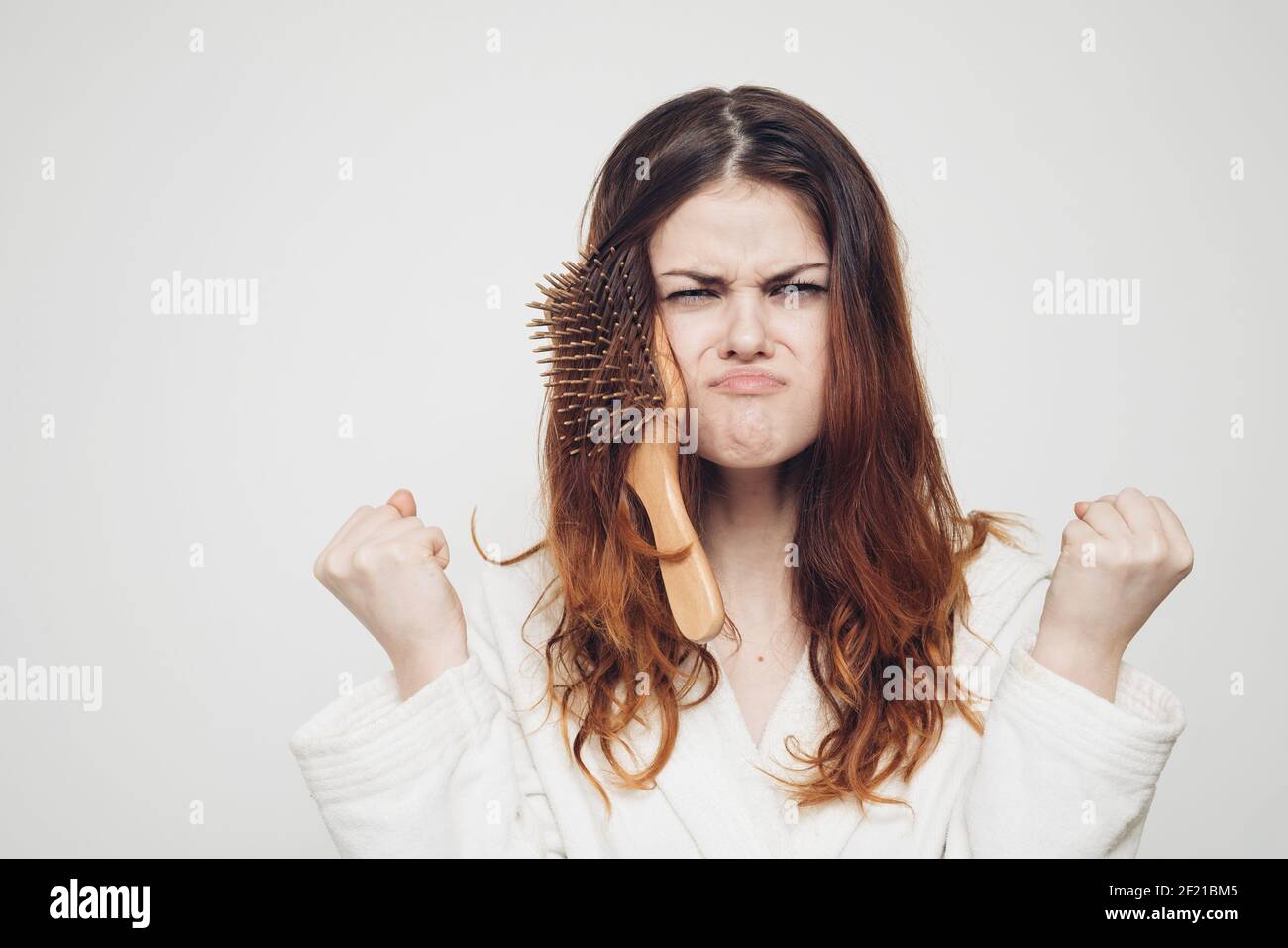 Woman tangled hair stuck hi-res stock photography and images - Alamy