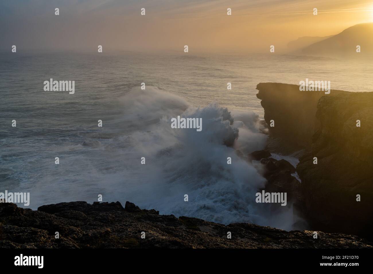 Ocean waves and cliffs at sunrise hi-res stock photography and images ...