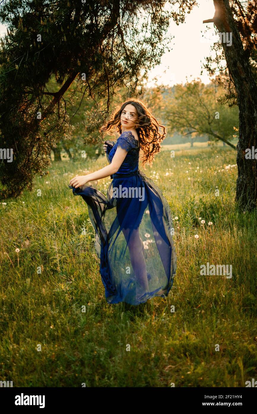 Party graduation prom fairytale concept. Beautiful brunette young woman ...