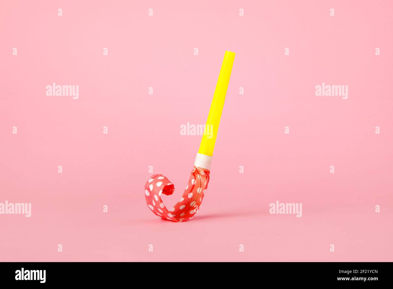 Birthday whistle over pink background, celebration and party concept ...