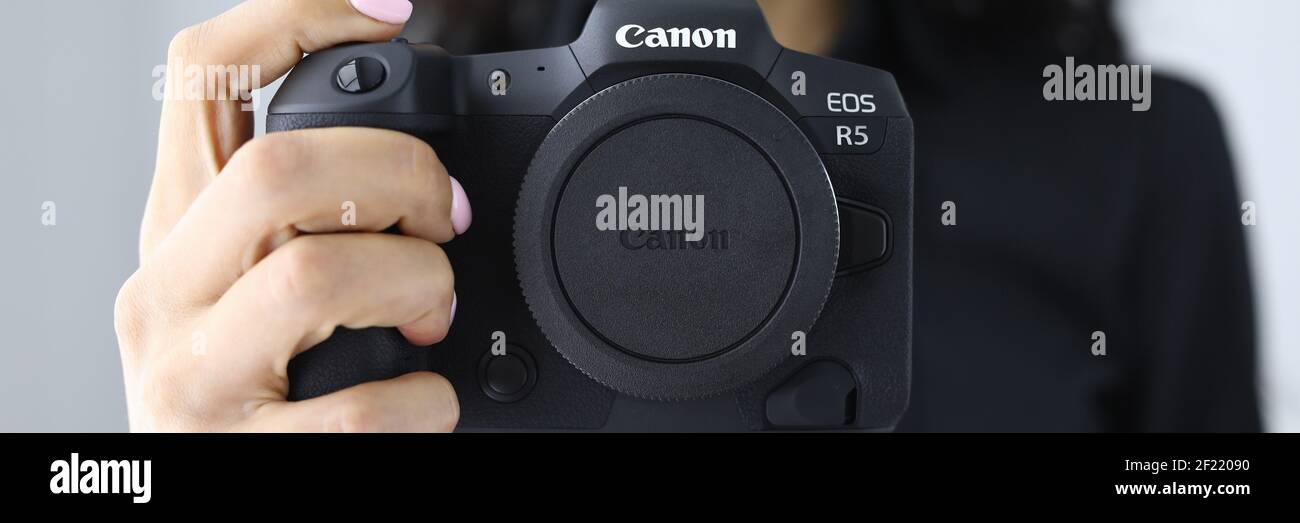 Video camera in hand canon video photo camera hi-res stock photography ...