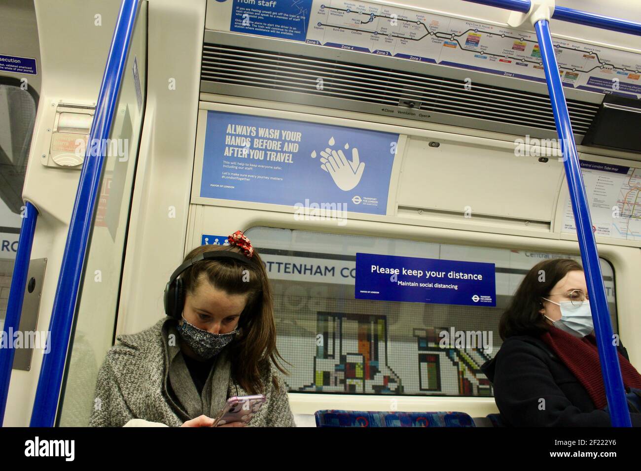 passengers and covid 19 pandemic face covering and social distancing ...
