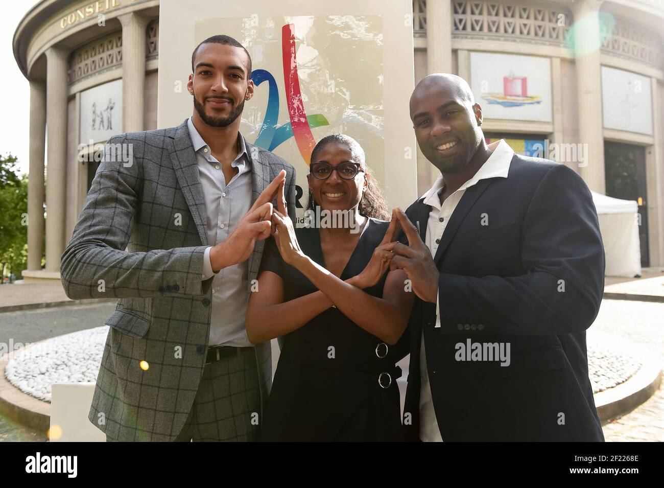 Rudy Gobert, Marie-Jose Perec and Teddy Riner pose with the Paris 2024 ...
