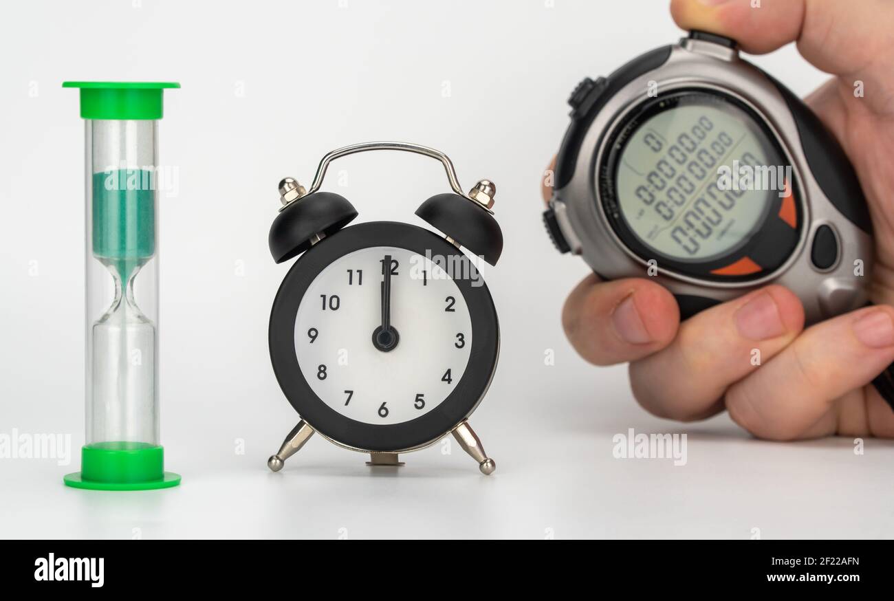 different time counters. selective focus. hourglass, alarm clock, and ...
