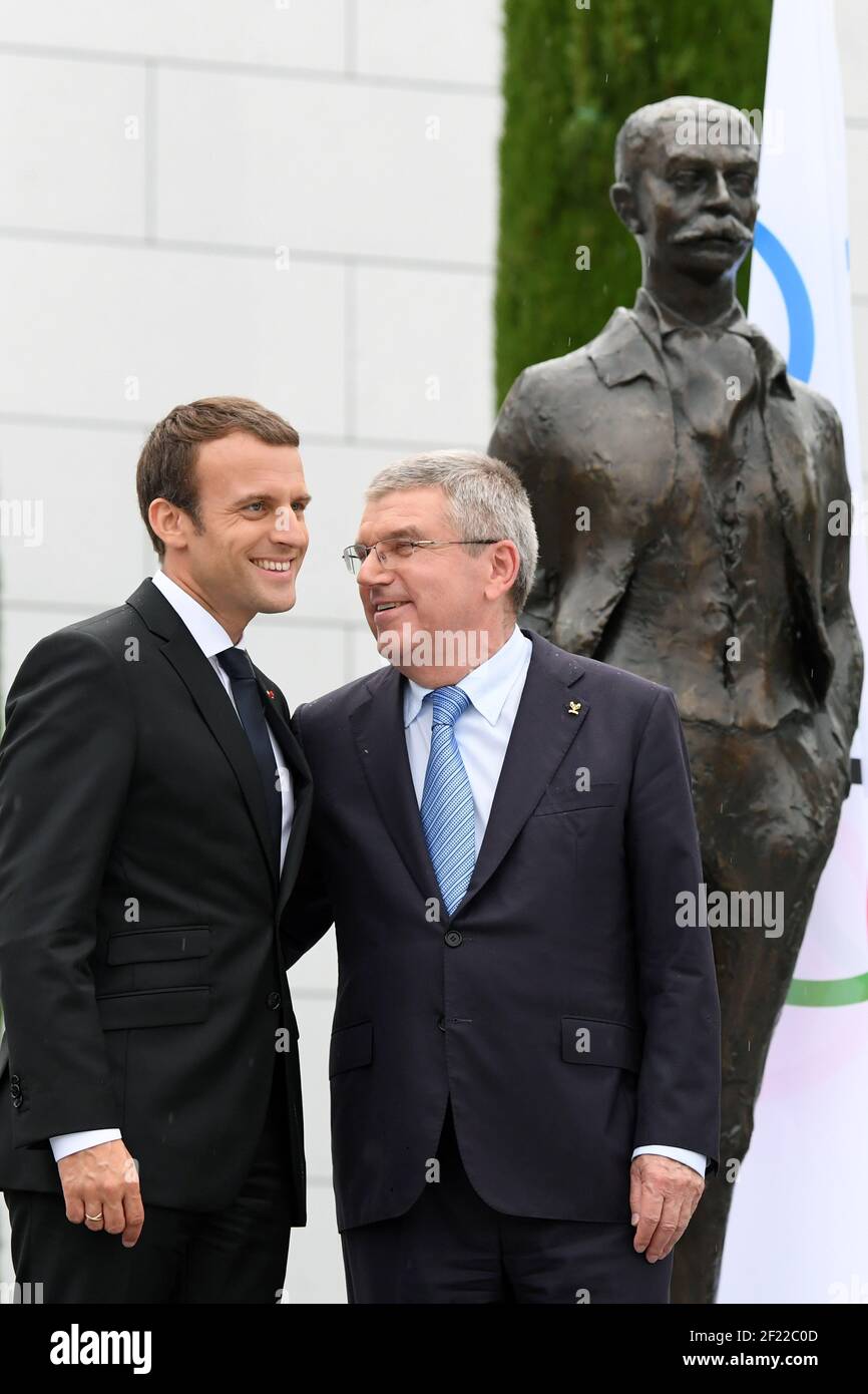 IOC President Thomas Bach and the president of French Republic Emmanuel ...