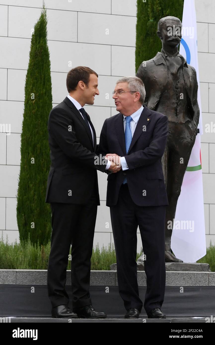 IOC President Thomas Bach and the president of French Republic Emmanuel ...
