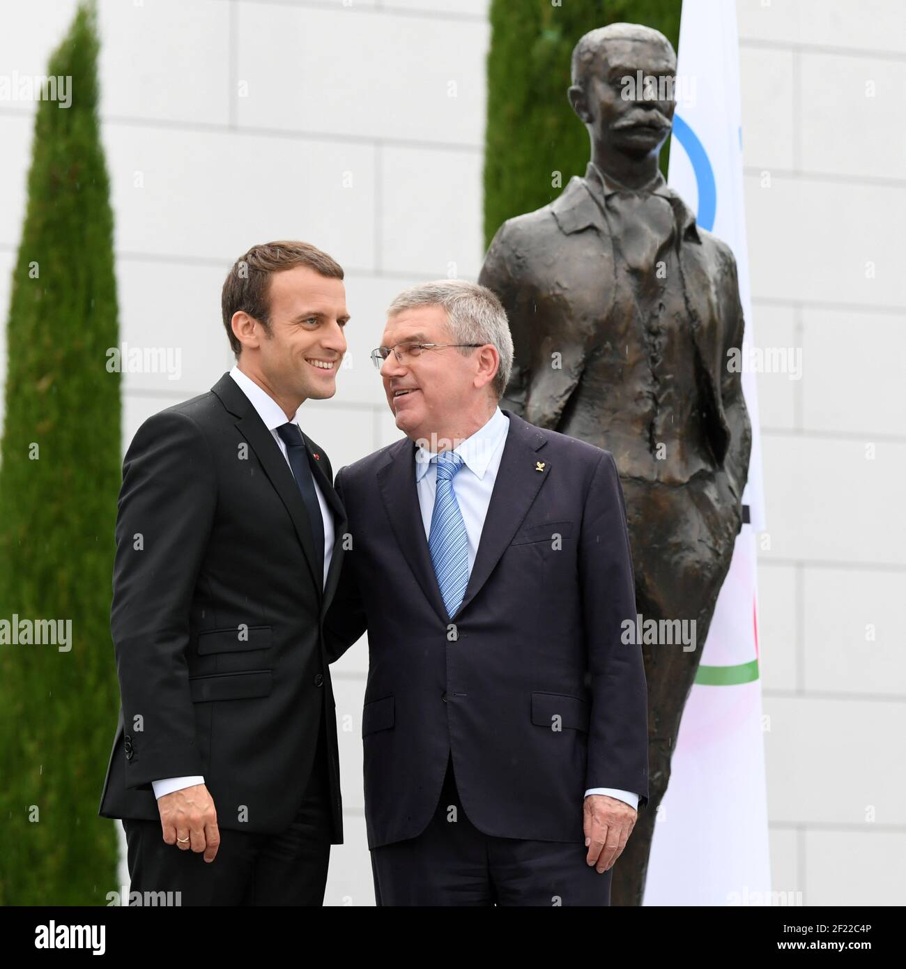 IOC President Thomas Bach and the president of French Republic Emmanuel ...