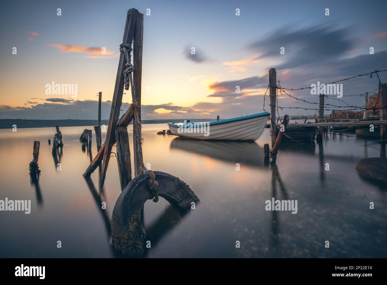 Small dock and fishing boat at fishing village, long exposure Stock ...