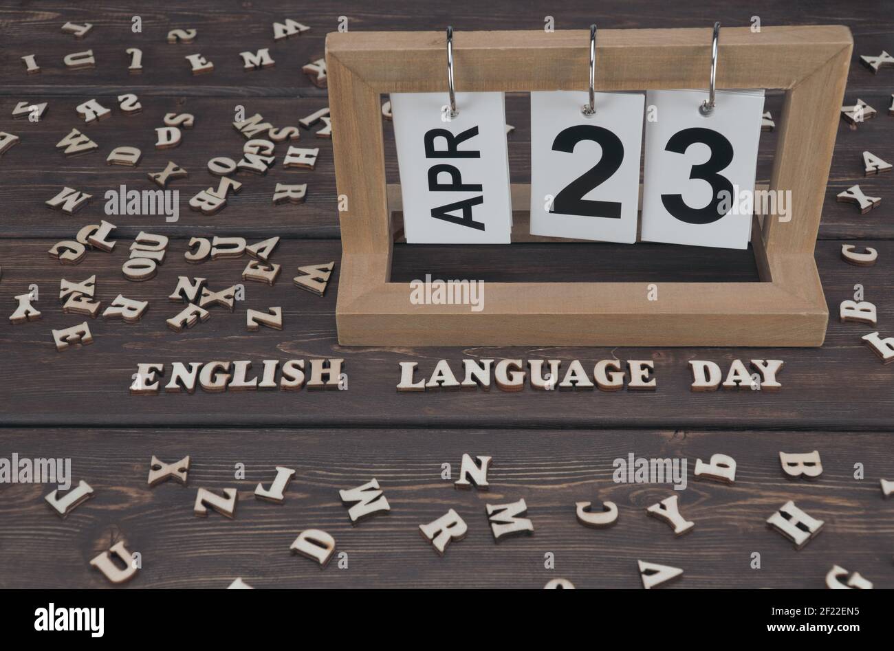April 23, date on the calendar. English Language Day. Handmade wood ...