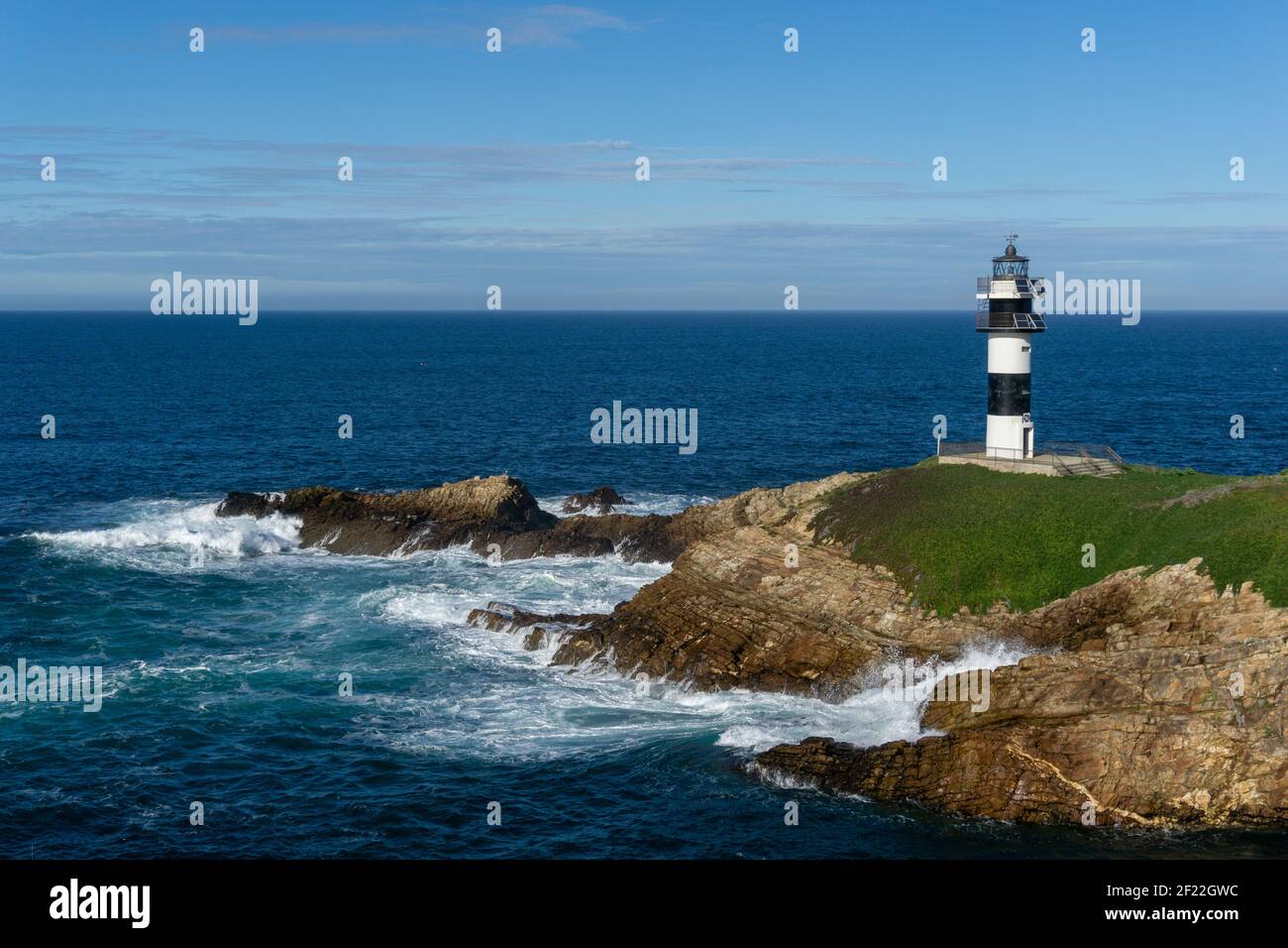 View of the lighthouse on Isla Pancha in Galicia Stock Photo - Alamy