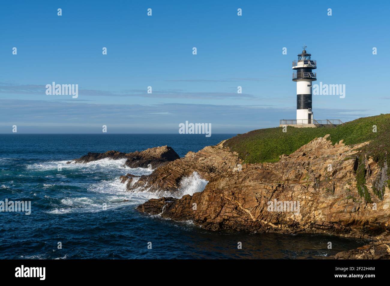 A view of the lighthouse on Isla Pancha in Galicia Stock Photo - Alamy