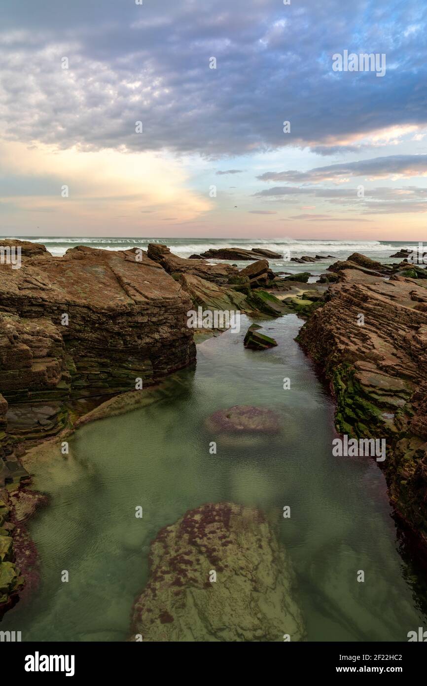 Beautiful sunrise at the Playa de las Catedrales Beach in Galicia in ...