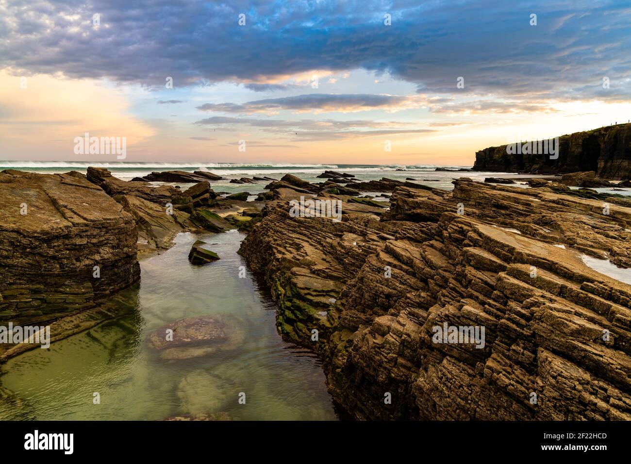 Beautiful sunrise at the Playa de las Catedrales Beach in Galicia in ...