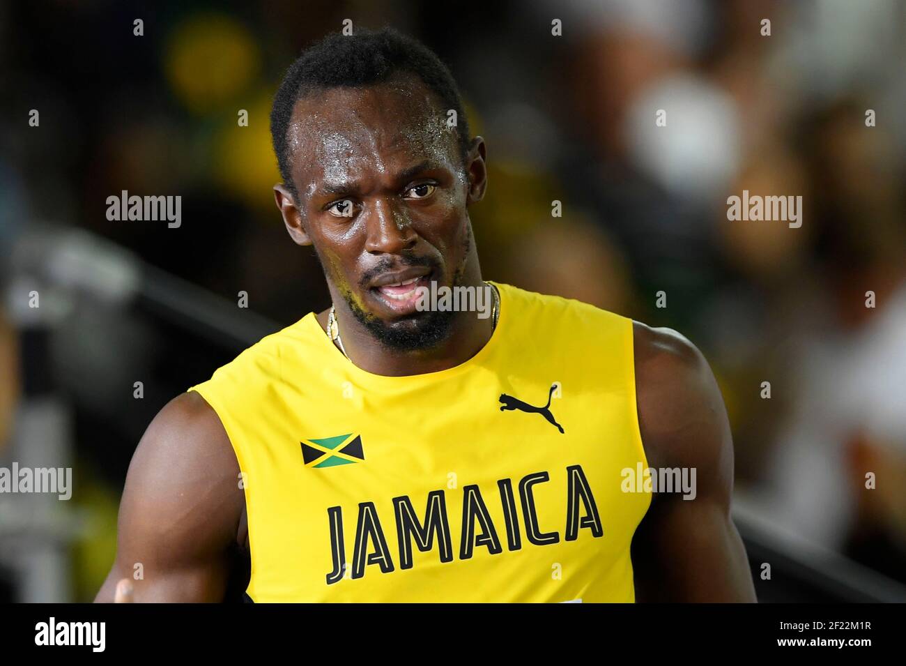 Usain Bolt (JAM) competes in 100 Metres Men during the Athletics World ...