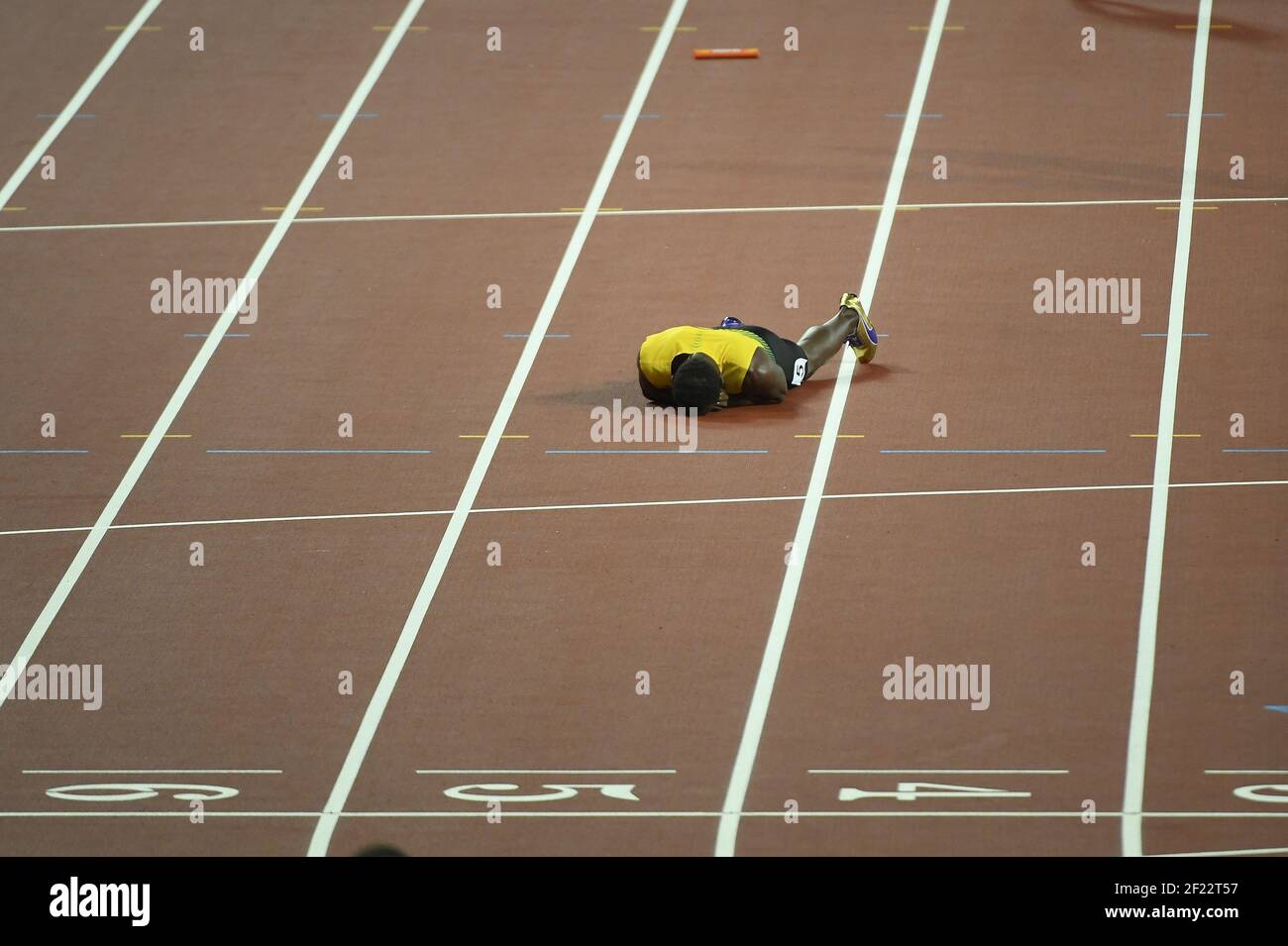 Usain Bolt (JAM) falls down in track after injured on Men's 4X100 m ...