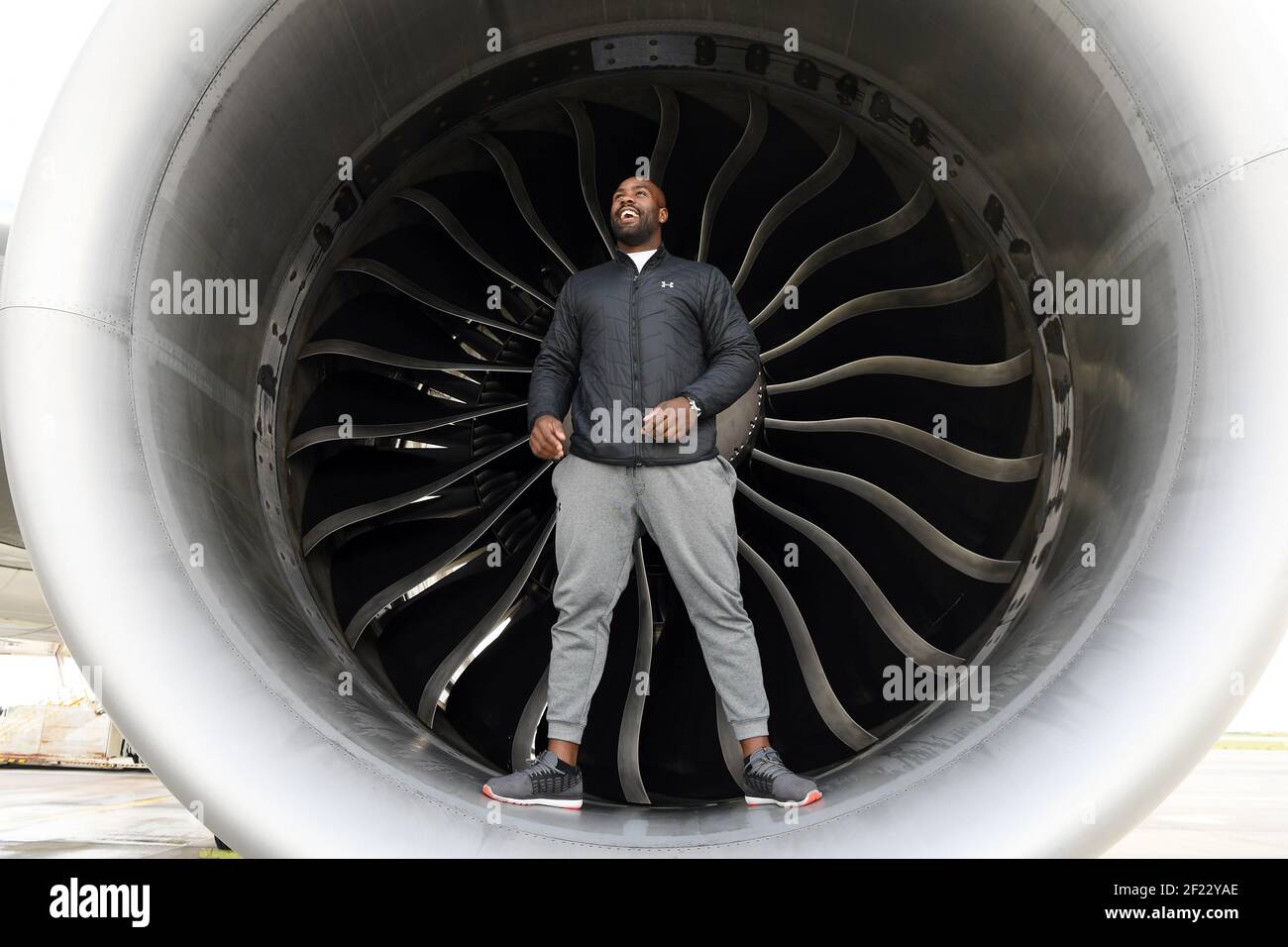 Teddy Riner poses in the aircraft's reactor during the return of the ...