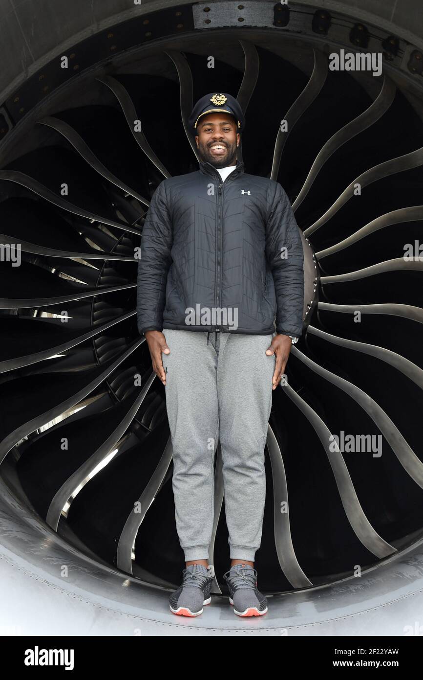Teddy Riner poses in the aircraft's reactor during the return of the ...