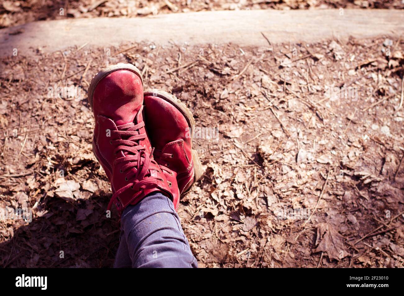 faceless child with red shoes and jeans sitting and relaxing Stock ...