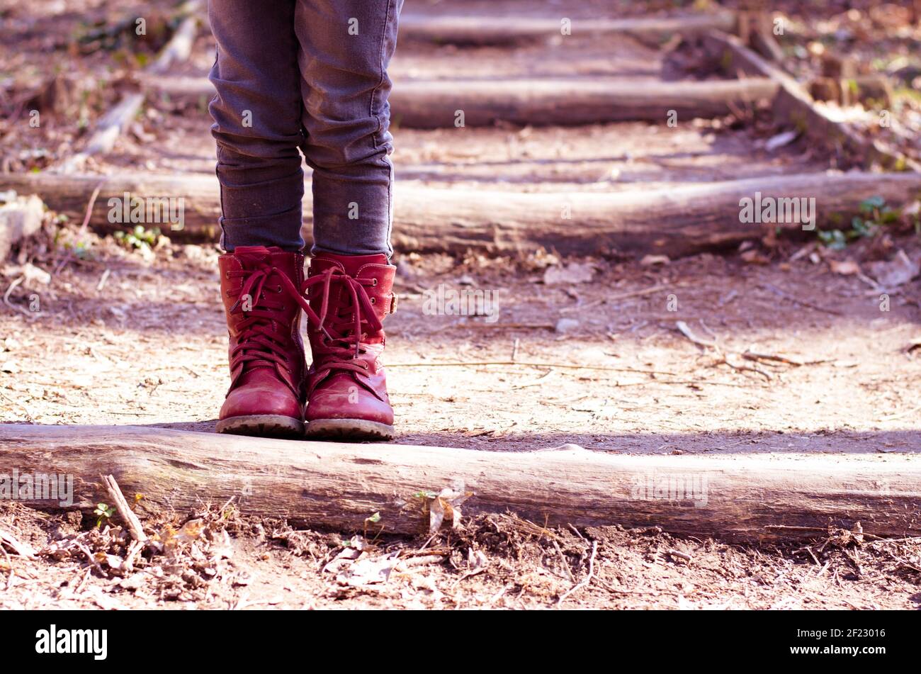 faceless child with red shoes and jeans standing on stairs Stock Photo ...